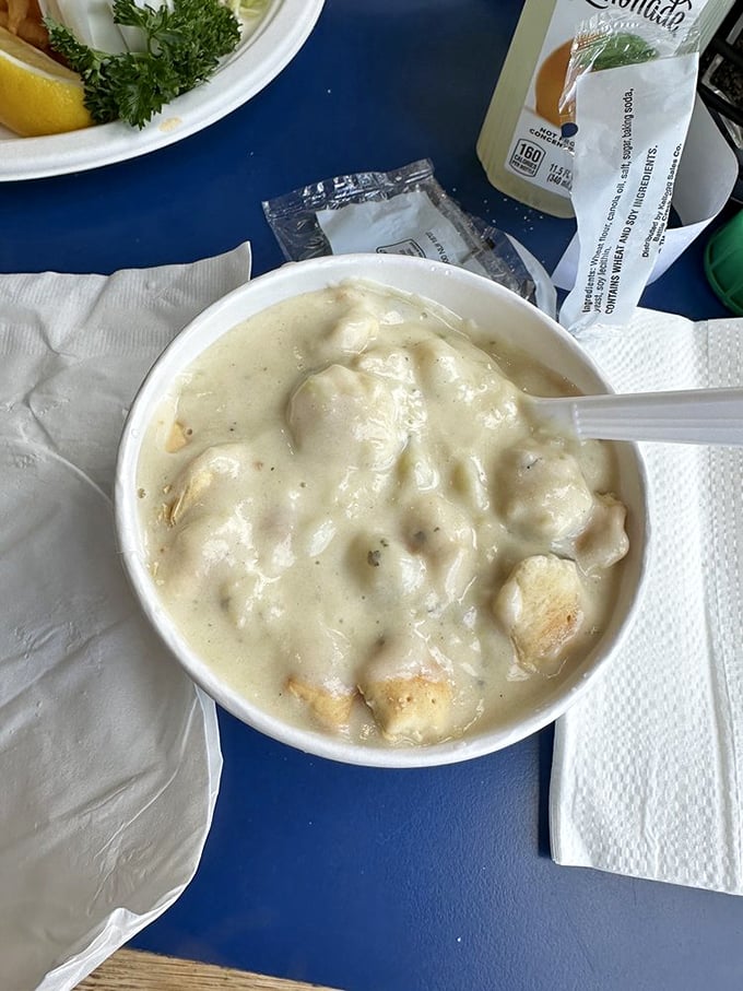 Clam chowder so hearty it could qualify as a meal. Those aren't just potatoes and clams – they're little islands of joy in a creamy sea.