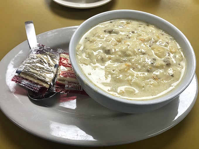 Clam chowder so creamy it could make New England jealous. Those crackers aren't accessories—they're essential supporting actors in this comfort food drama.