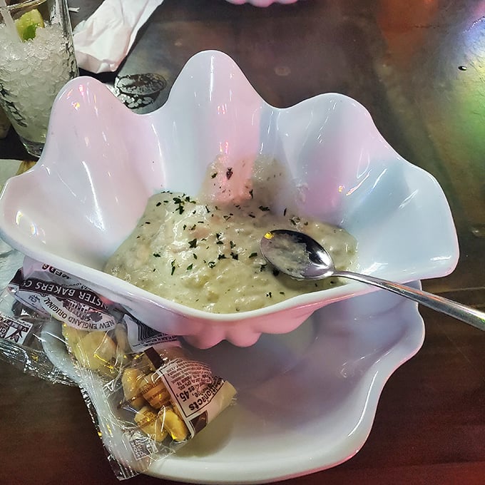 Clam chowder served in a shell-shaped bowl—because in Florida, even the dishware dresses for the occasion.