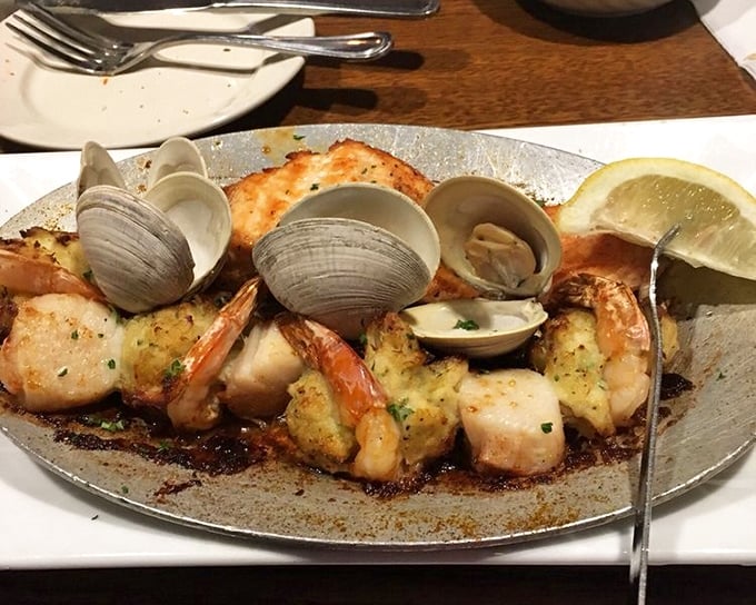 These aren't just shellfish—they're ocean ambassadors on a sizzling hot plate, telling delicious stories of the sea with every buttery, garlicky bite. 