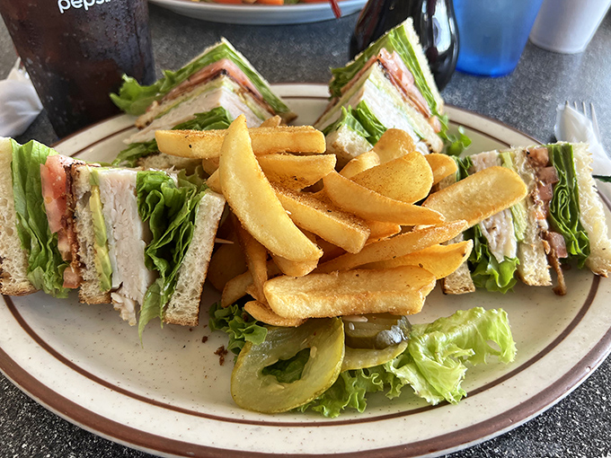 The club sandwich – architecture you can eat! Perfectly stacked layers that would make Frank Lloyd Wright nod in approval.