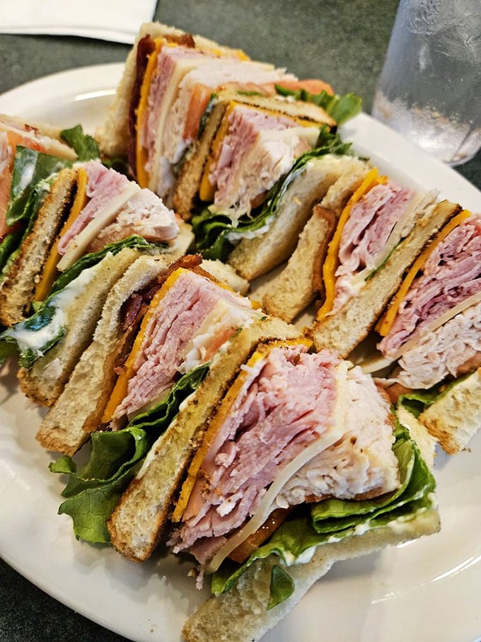 This club sandwich isn't playing around—it's layered like a perfect geological formation of deliciousness. Archeologists of hunger, take note.
