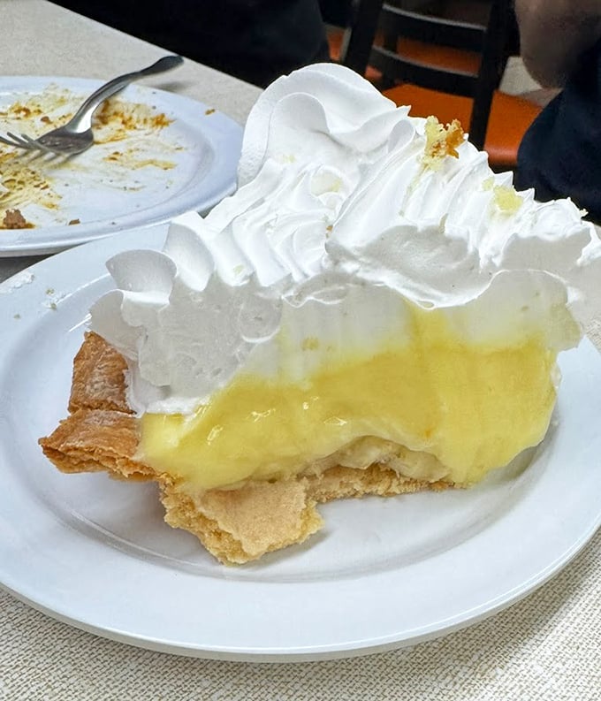 Lemon cream pie with a mountain of meringue that would make your grandmother weep with joy. Dessert doesn't get more gloriously old-school than this.