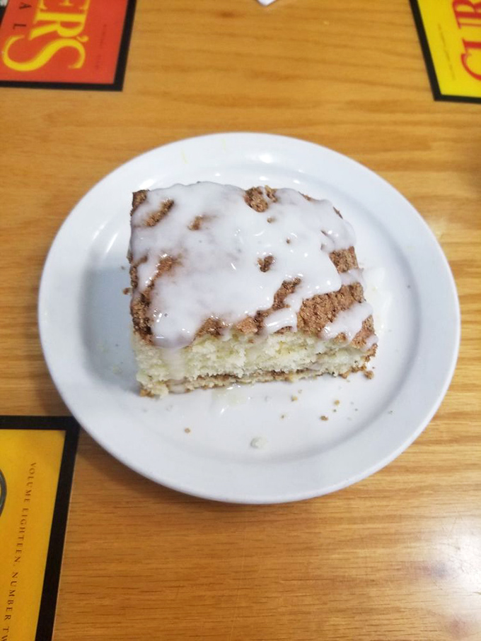 Coffee cake that makes you question why we don't eat dessert for breakfast more often. That glaze isn't just topping—it's liquid happiness.