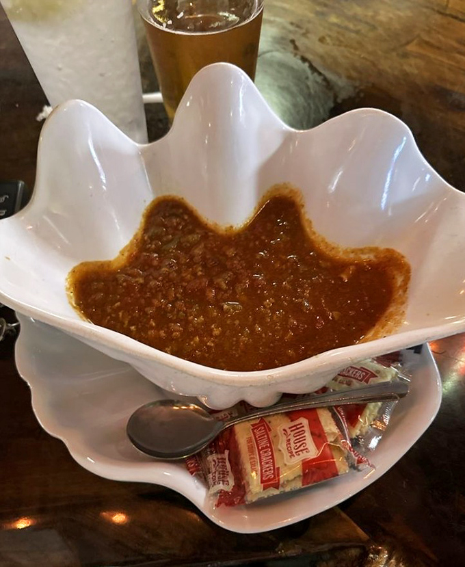 That shell-shaped bowl isn't just cute—it's holding conch chowder so authentic you'll hear the ocean with every spoonful.
