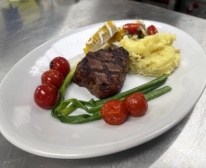 Steak this good doesn't need fancy explanations—just a moment of silence to appreciate the wood-fired magic happening on your plate.