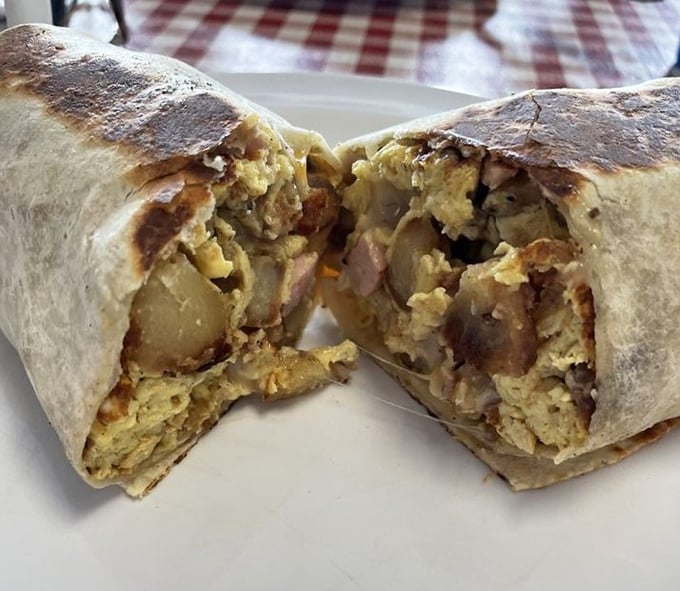 This breakfast burrito doesn't just start your day—it launches it into the stratosphere of satisfaction. Look at those perfectly grilled edges!