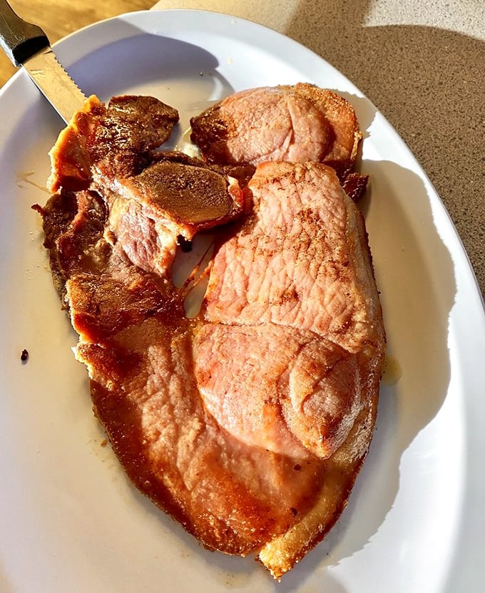 Country ham that doesn't mess around—this isn't some dainty prosciutto, it's the heavyweight champion of breakfast meats.