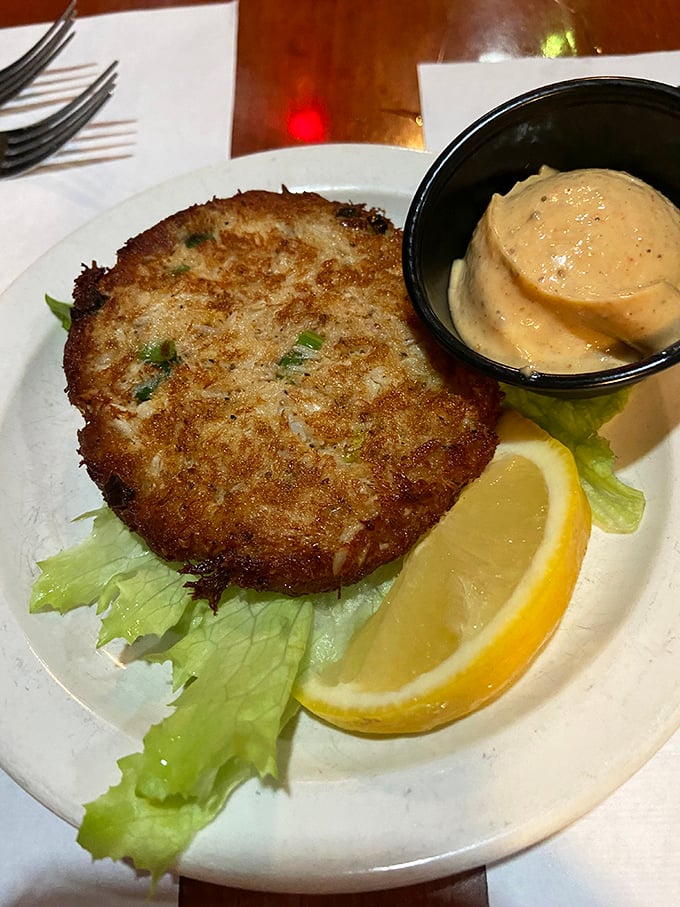 This crab cake isn't playing games – all meat, minimal filler, and a remoulade sauce that would make New Orleans jealous.