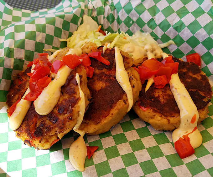 These crab cakes aren't playing around – beautifully seared and topped with a sauce that makes you wonder why you'd order anything else.