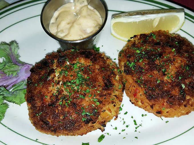 These crab cakes aren't playing games—golden-brown perfection with zero filler nonsense. The kind of seafood that makes Midwesterners forget they're landlocked.