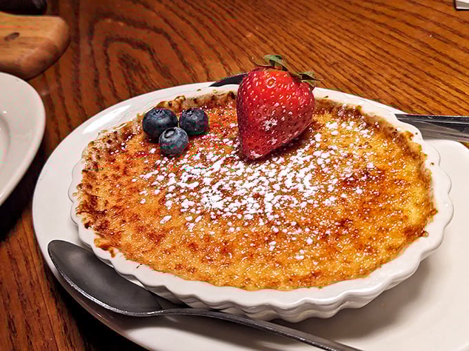 This crème brûlée doesn't just have a perfect crack—it's wearing a berry beret that would make Prince proud.