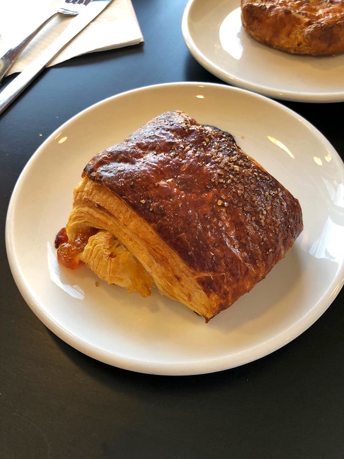 This isn't just a croissant; it's a masterclass in butter architecture—flaky, bronzed, and waiting to shatter into a thousand delicious pieces with each bite.