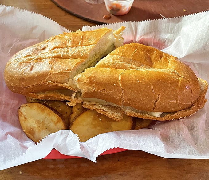 A proper Cuban sandwich served with home fries – the kind of honest, unpretentious lunch that makes you wonder why you ever eat anything else.