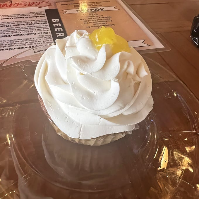 Whipped cream mountains with lemon sunshine peaks. This dessert doesn't just satisfy sweet cravings—it conquers them completely.