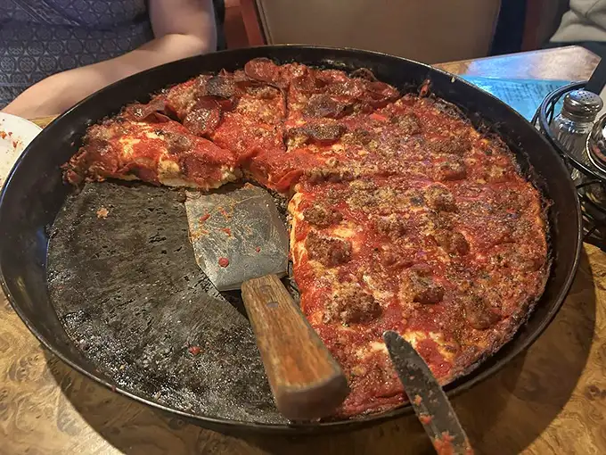 The money shot: that caramelized crust, those chunks of sausage, the sauce-to-cheese ratio that pizza mathematicians have been trying to calculate for decades.