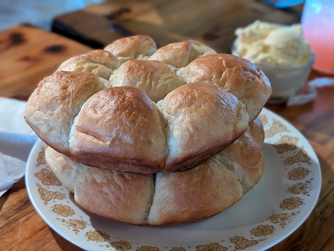 These aren't just dinner rolls—they're pillowy monuments to gluten, waiting to be slathered with honey butter and devoured with abandon.