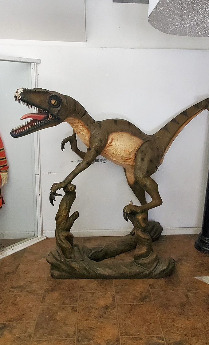 This velociraptor appears ready to audition for "Jurassic Park: The Musical." Those tiny arms have big dreams.