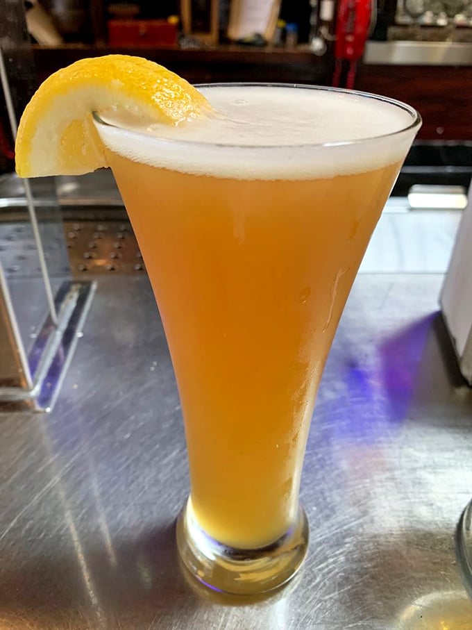 This isn't just beer; it's liquid history served in Joe Jost's signature schooner—tall, cold, and topped with a lemon slice that says, "This isn't your first rodeo."