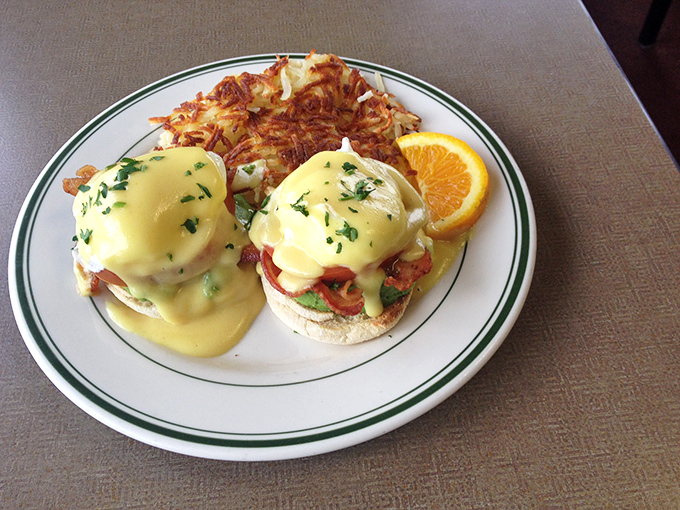 These Eggs Benedict aren't trying to reinvent breakfast; they're just executing it flawlessly with golden hollandaise cascading over Canadian bacon like a sunrise worth waking up for.