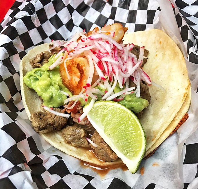 The El Camino taco – where steak meets Gulf prawns in a tortilla tango that would make even the most jaded foodie swoon.
