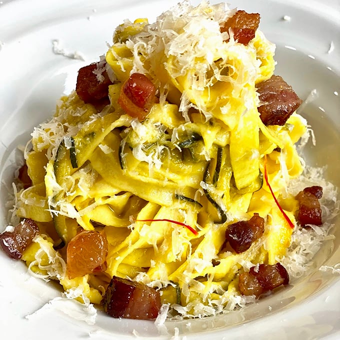 This fettuccine dish isn't just comfort food; it's like receiving a warm hug from someone who genuinely likes you. The cheese-to-pasta ratio? Perfection.
