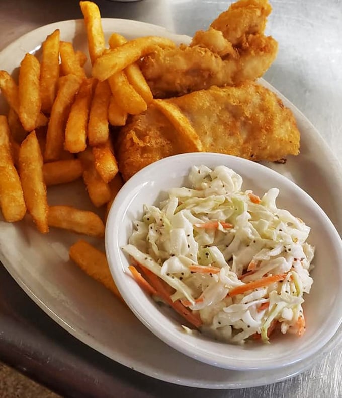 Golden-fried fish that crunches like autumn leaves, served with crispy fries and house-made coleslaw. Seafood in the mountains? Somehow, it works.