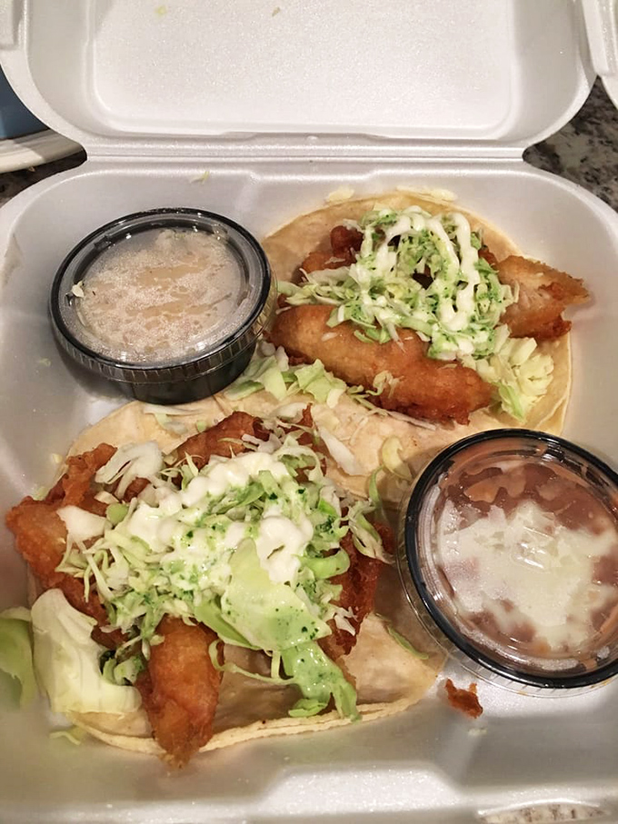 These fish tacos aren't just a meal—they're a coastal vacation in handheld form. The crispy batter and fresh cabbage slaw might make you hear seagulls.