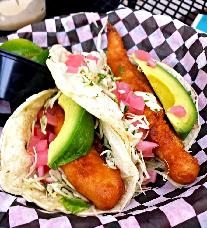 Fish tacos that make you question why you ever eat anything else. That avocado-slaw-fish harmony is pure edible poetry.