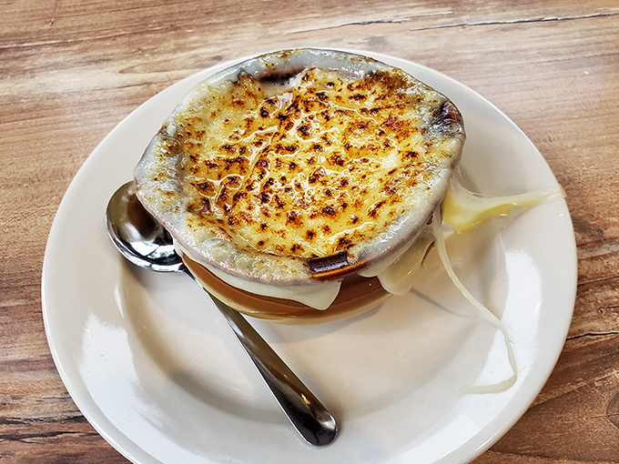 French onion soup that doesn't just warm your body but hugs your soul – that cheese pull should win Olympic medals.