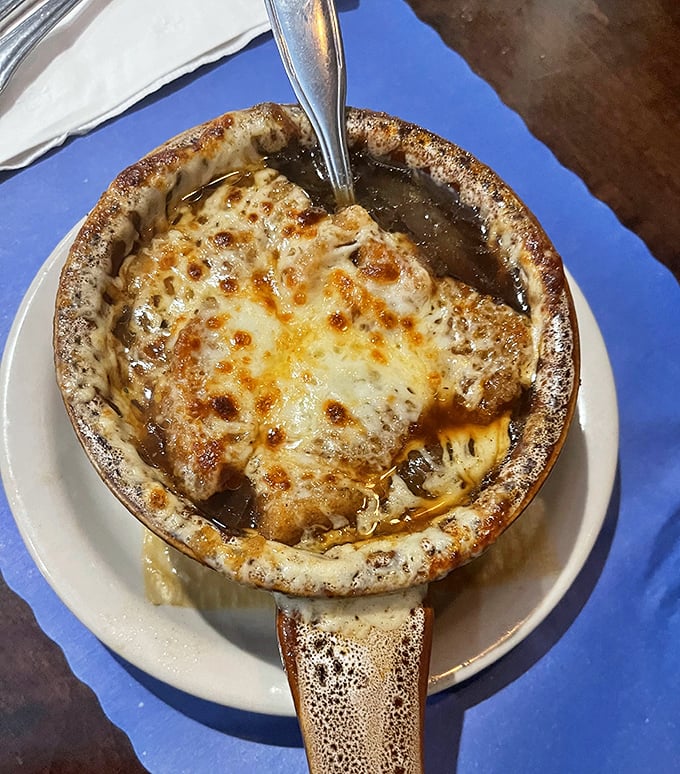 French onion soup that doesn't just warm your body but hugs your soul—that cheese pull is what dreams are made of.
