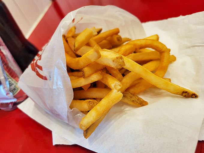 Golden, crispy, and perfectly salted—these fries aren't just a side dish, they're the Robin to your burger's Batman.