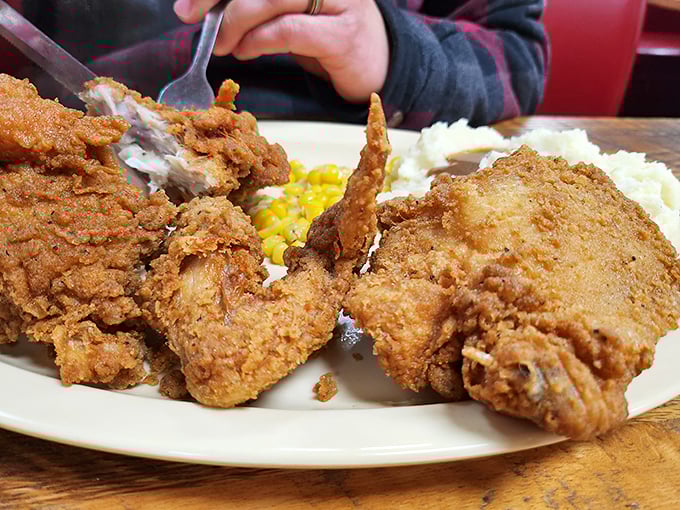 Fried chicken that would make your grandmother both jealous and proud. The golden crust shatters with each bite, revealing juicy meat that needs no introduction.