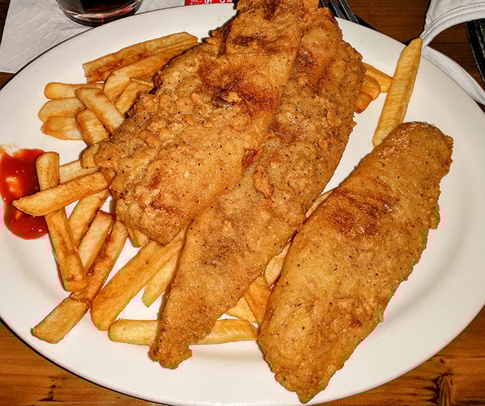 Crispy on the outside, flaky on the inside—this fish puts the "comfort" in comfort food, paired with fries that could make a Frenchman weep.