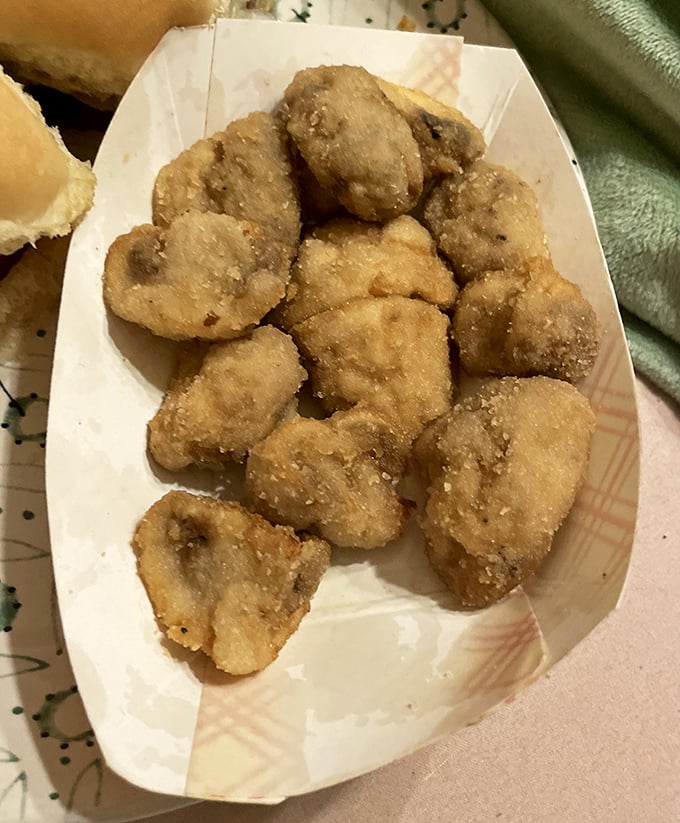 Fried mushrooms that look like little nuggets of gold. Crispy outside, earthy and juicy inside – nature's perfect snack.