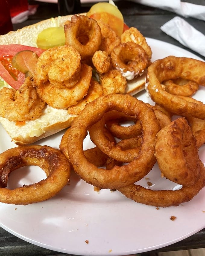 Golden-fried shrimp and onion rings that crunch like autumn leaves—comfort food that makes you wonder why anyone bothers with fancy molecular gastronomy.