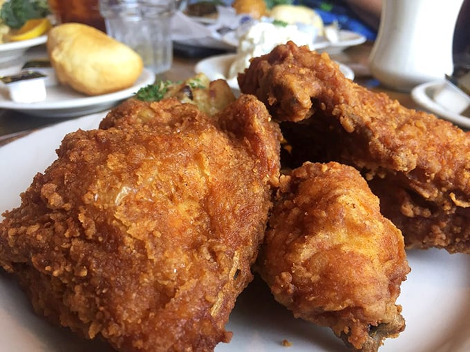 This fried chicken doesn't just have a golden crust—it has a PhD in crispiness with a minor in juicy perfection.