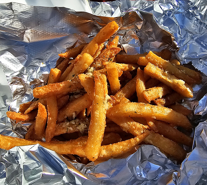 Golden, crispy, and glistening with seasoning, these fries aren't just a side dish—they're the supporting actor that steals every scene.