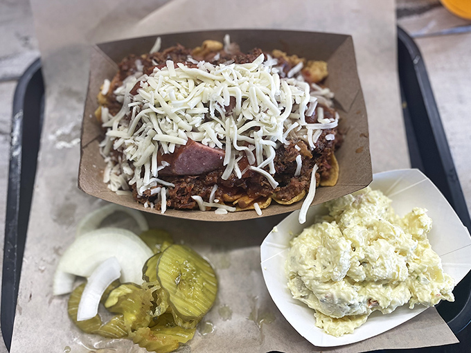 Frito pie elevated to art form status. When chips, meat, and cheese come together like this, resistance is not just futile—it's foolish.