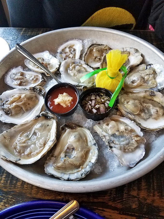 A dozen glistening oysters arranged like a clock face—though unlike time, these beauties wait for no one. Slurp accordingly.