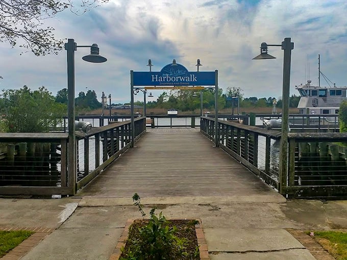 The Harborwalk beckons with maritime promises – step onto these wooden planks and leave your landlubber worries on solid ground.