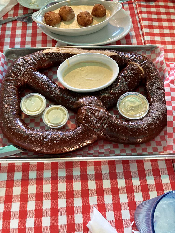This isn't just a pretzel – it's a carb monument that demands respect, admiration, and plenty of dipping sauce.