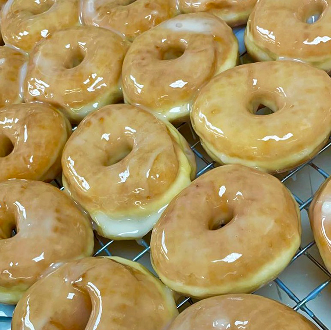 Glazed donuts glistening under the bakery lights like Olympic gold medals for your taste buds. Simple perfection needs no explanation.
