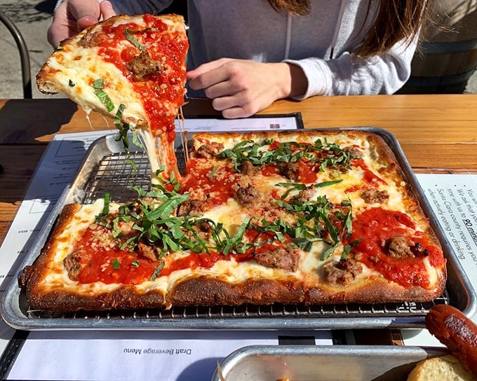 The Grandma Pie doesn't just have cheese pull—it has cheese drama. Like watching the final rose ceremony, but infinitely more satisfying.