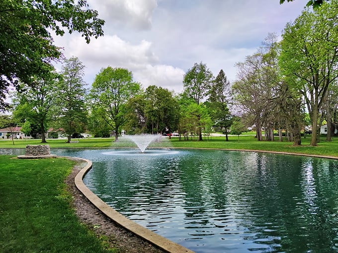 Greenville City Park's serene pond and fountain create an oasis of tranquility. The perfect spot for contemplating life—or your next meal.