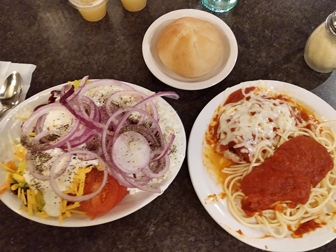 When Italian meets American comfort food, magic happens—that golden chicken parmesan speaks fluent deliciousness in any language.