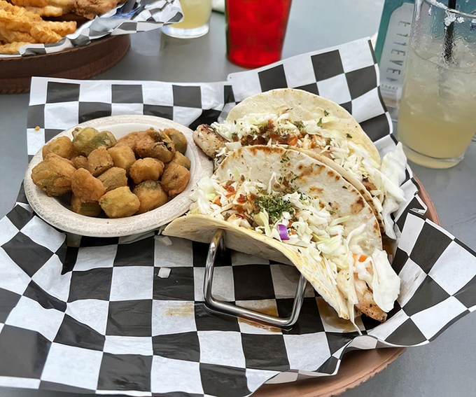 These tacos don't need passports to transport you—fresh shrimp, crunchy slaw, and that side of fried okra is pure Southern comfort.