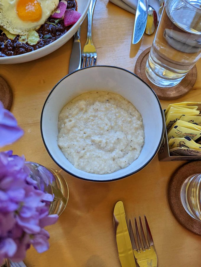 These aren't your grandmother's grits—unless your grandmother was secretly a culinary genius who understood the profound comfort of perfectly creamy Southern comfort.