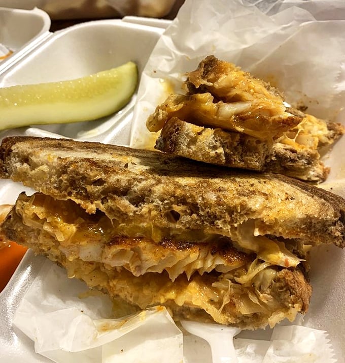 The legendary Grouper Reuben in all its glory—where fish meets sauerkraut in a marriage that somehow makes perfect sense.