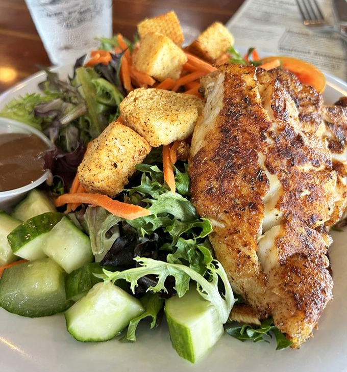 Grouper done Dixie style – swimming in garlic butter and looking like golden sunshine on a plate.